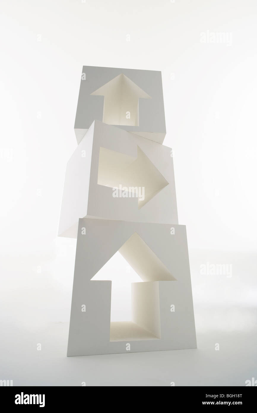 Stack of cubes with arrows Stock Photo - Alamy