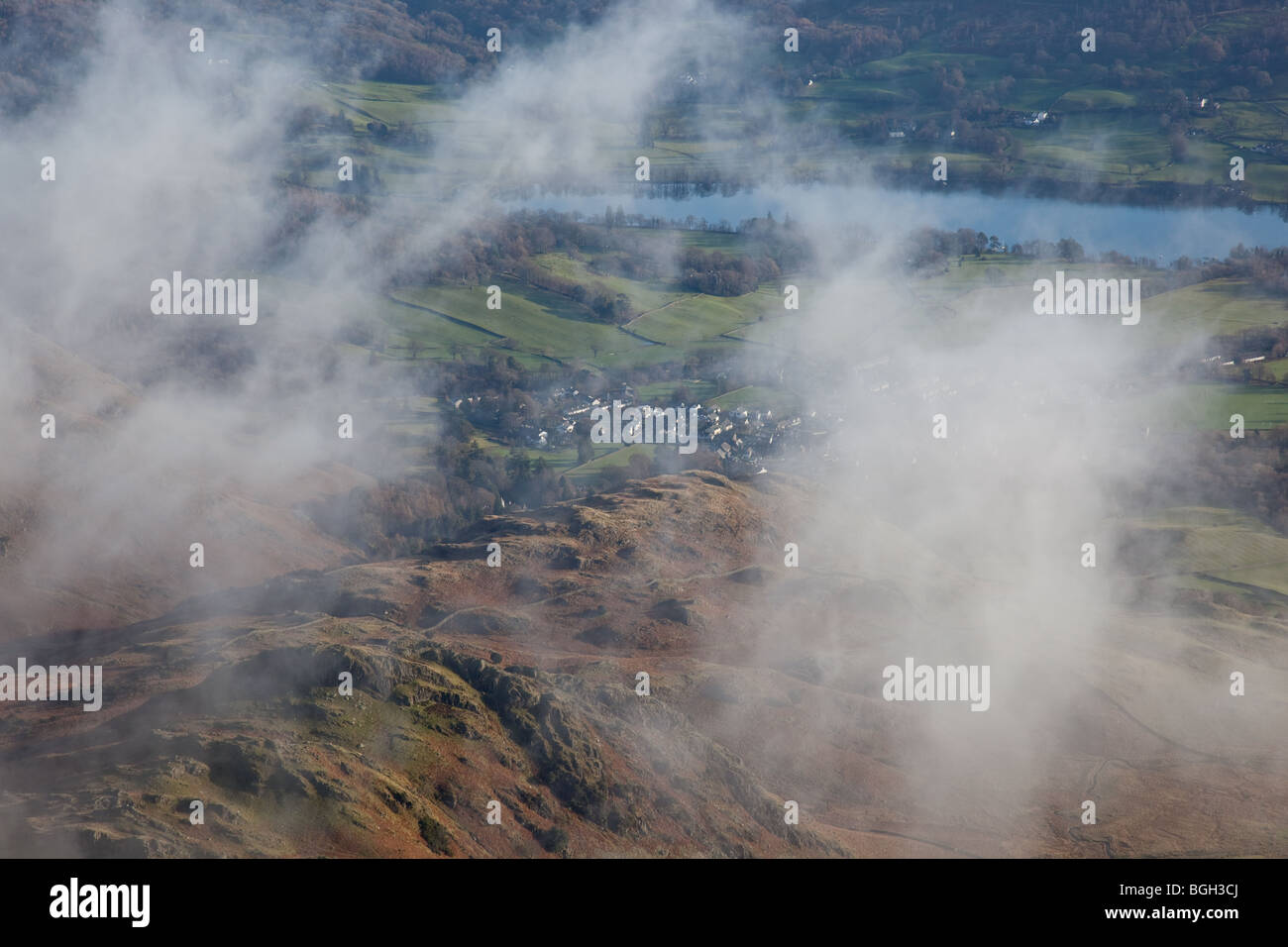 Coniston village seen through low cloud, as seen from the Old Man of ...