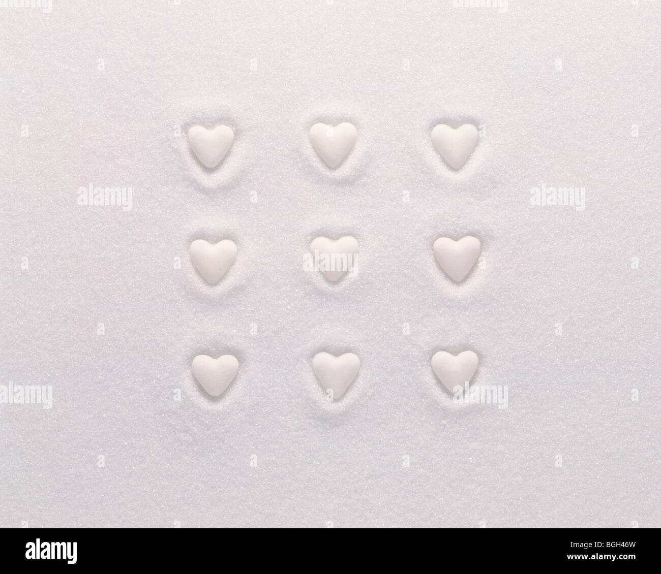 White chocolate hearts in sugar Stock Photo - Alamy