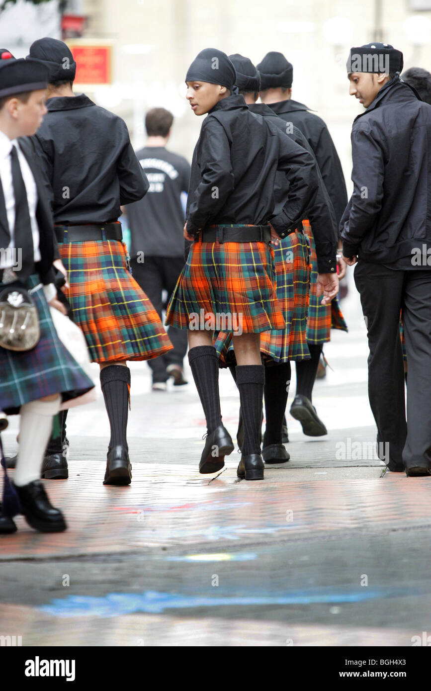 Kilted youths showing cultural differences Stock Photo - Alamy