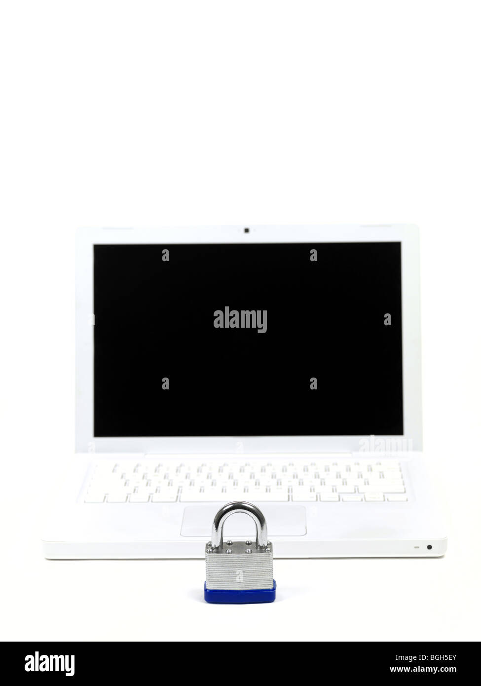 A laptop computer and a padlock isolated against a white background ...