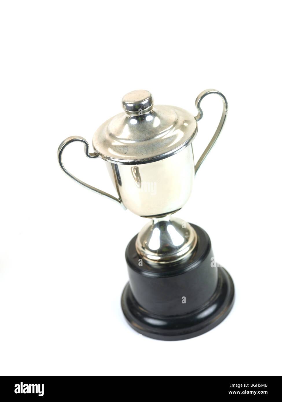 An old tarnished trophy isolated against a white background Stock Photo ...