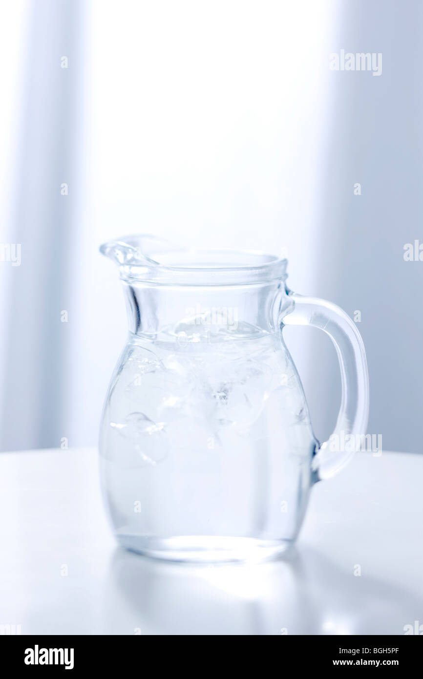 Glass jug of water Stock Photo - Alamy