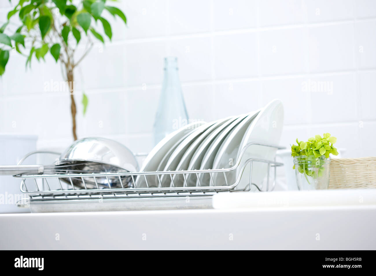 Dishes on a dish rack Stock Photo - Alamy