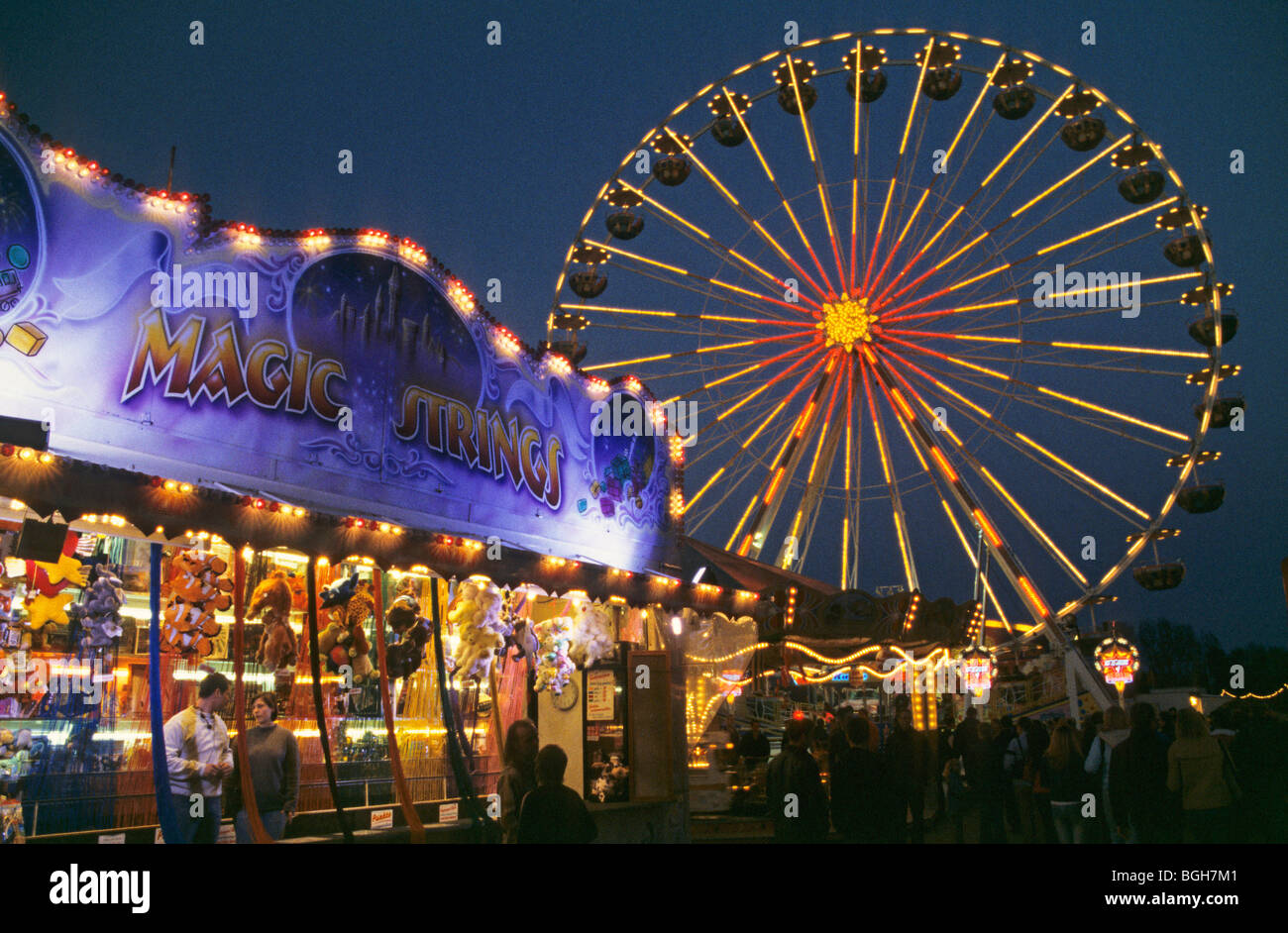 Fun Fair with Ferris Wheel Stock Photo - Alamy