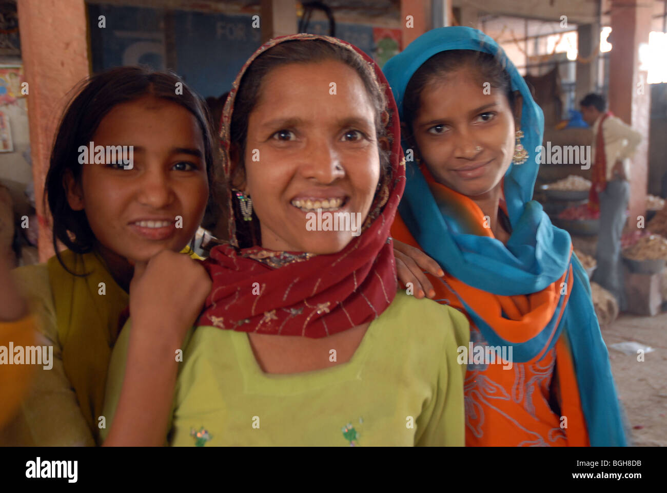 Rajasthani woman in red yellow hi-res stock photography and images - Alamy