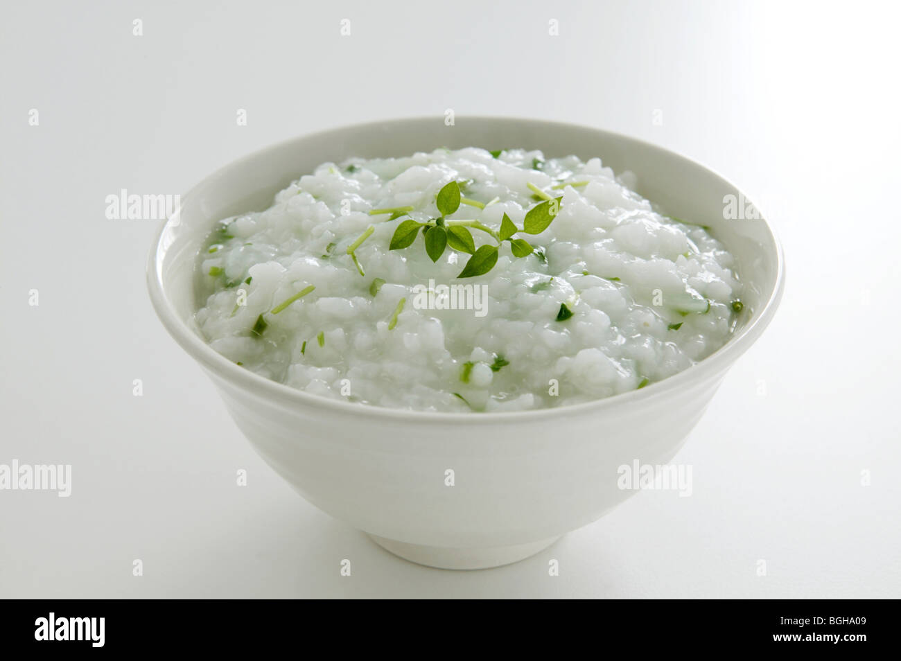 Rice gruel seasoned with herbs Stock Photo - Alamy
