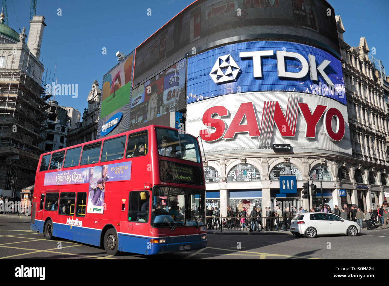 A red London bus passing through Piccadilly Circus, Central London, UK ...