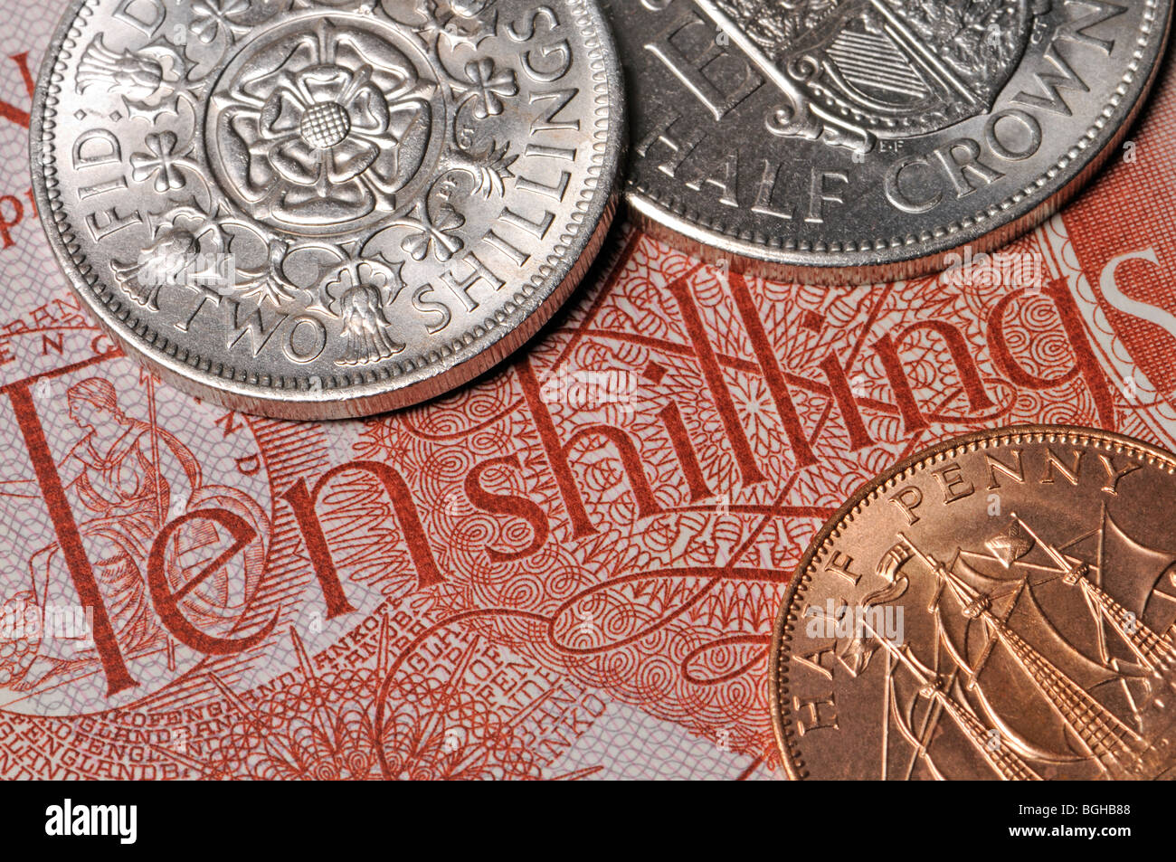 Pre-decimal British currency - half Crown, Florin and Half Penny on a ...