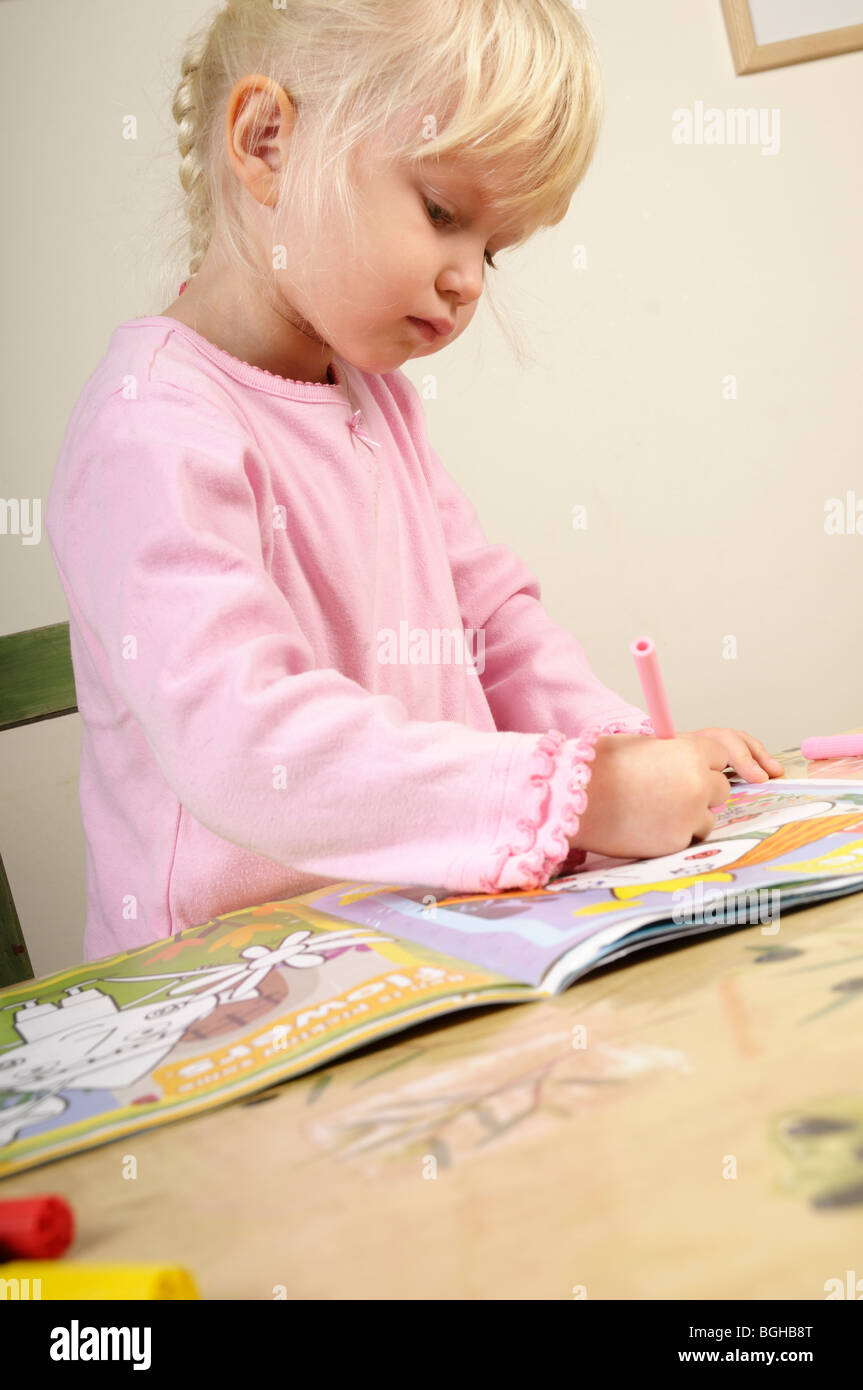 Four year old girl drawing High Resolution Stock Photography and Images ...