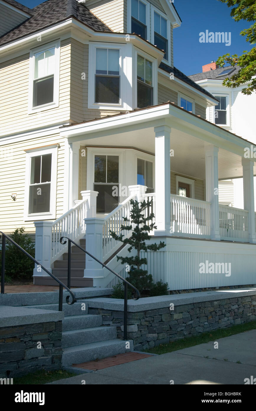 Traditional home with large front porch Stock Photo - Alamy