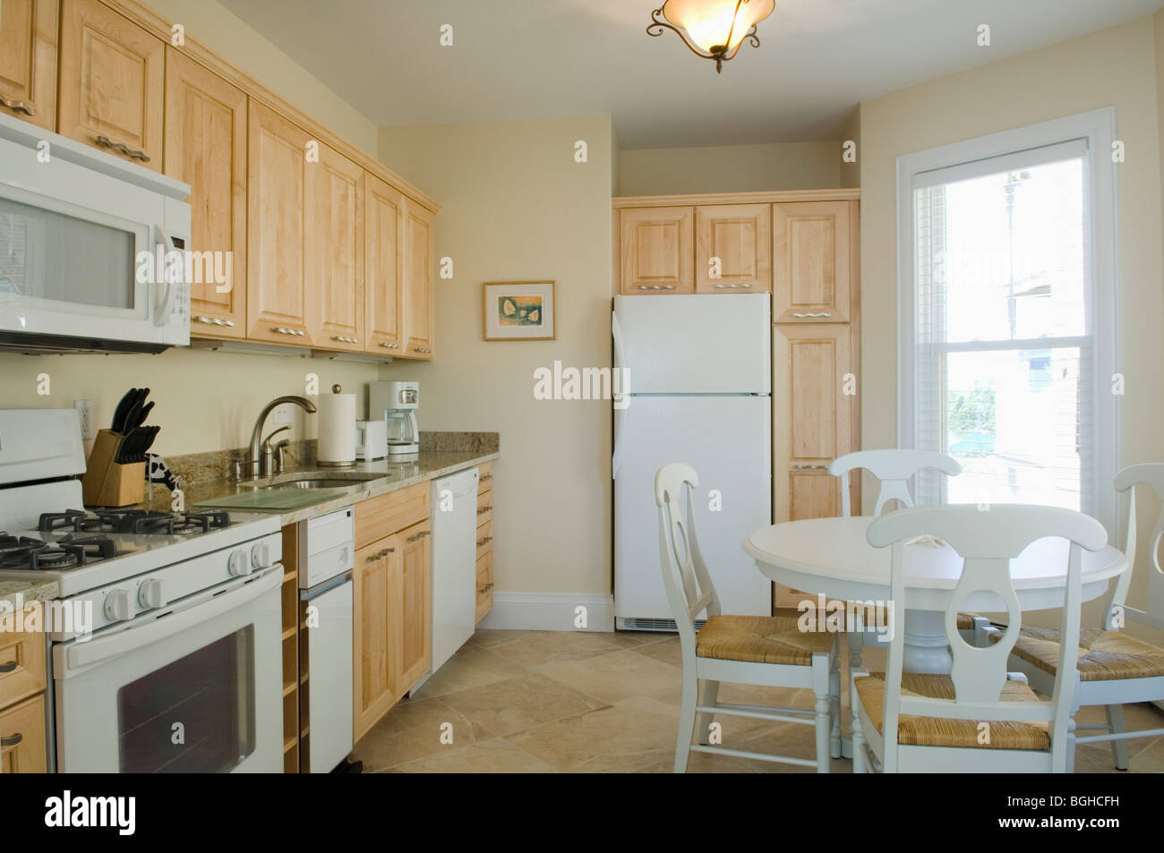 Traditional kitchen with light colored cabinets Stock Photo - Alamy