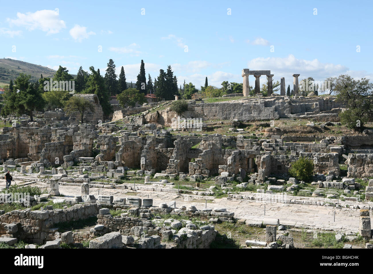 The Lechaion way - marble paved road in Ancient Corinth Greece with ...