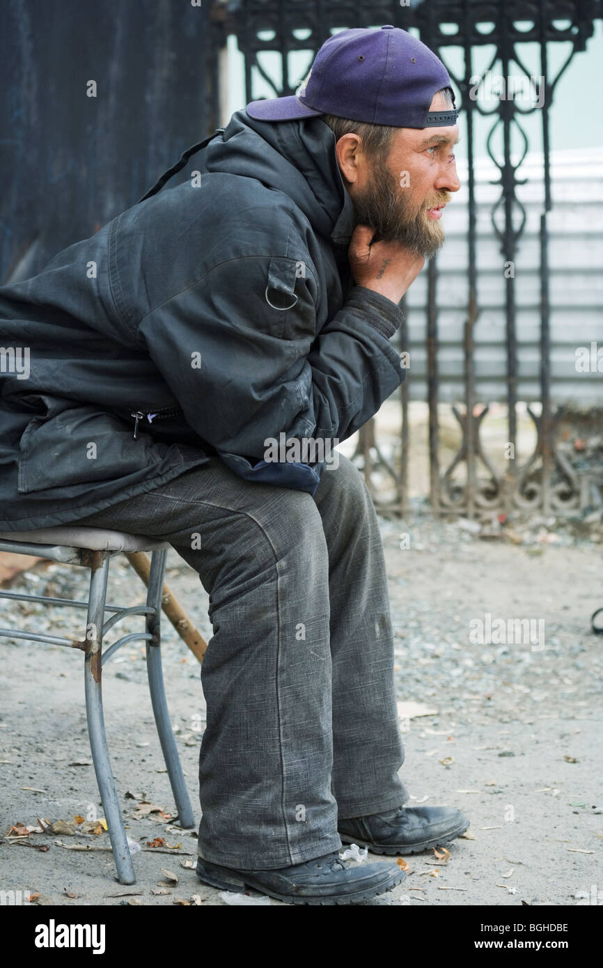 Homeless man on a city street Stock Photo - Alamy
