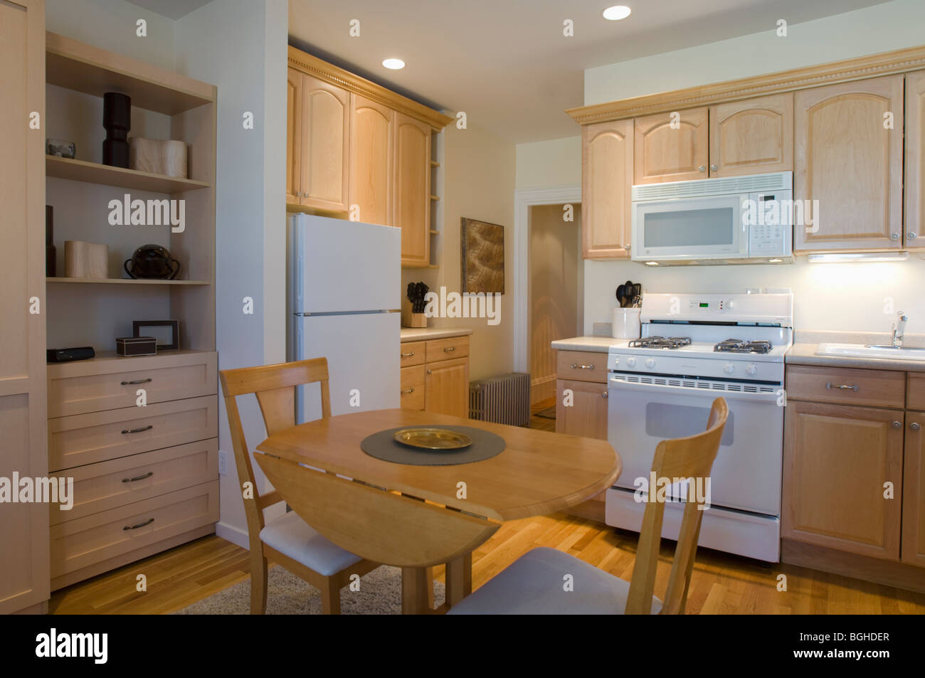 Kitchen in studio apartment Stock Photo - Alamy