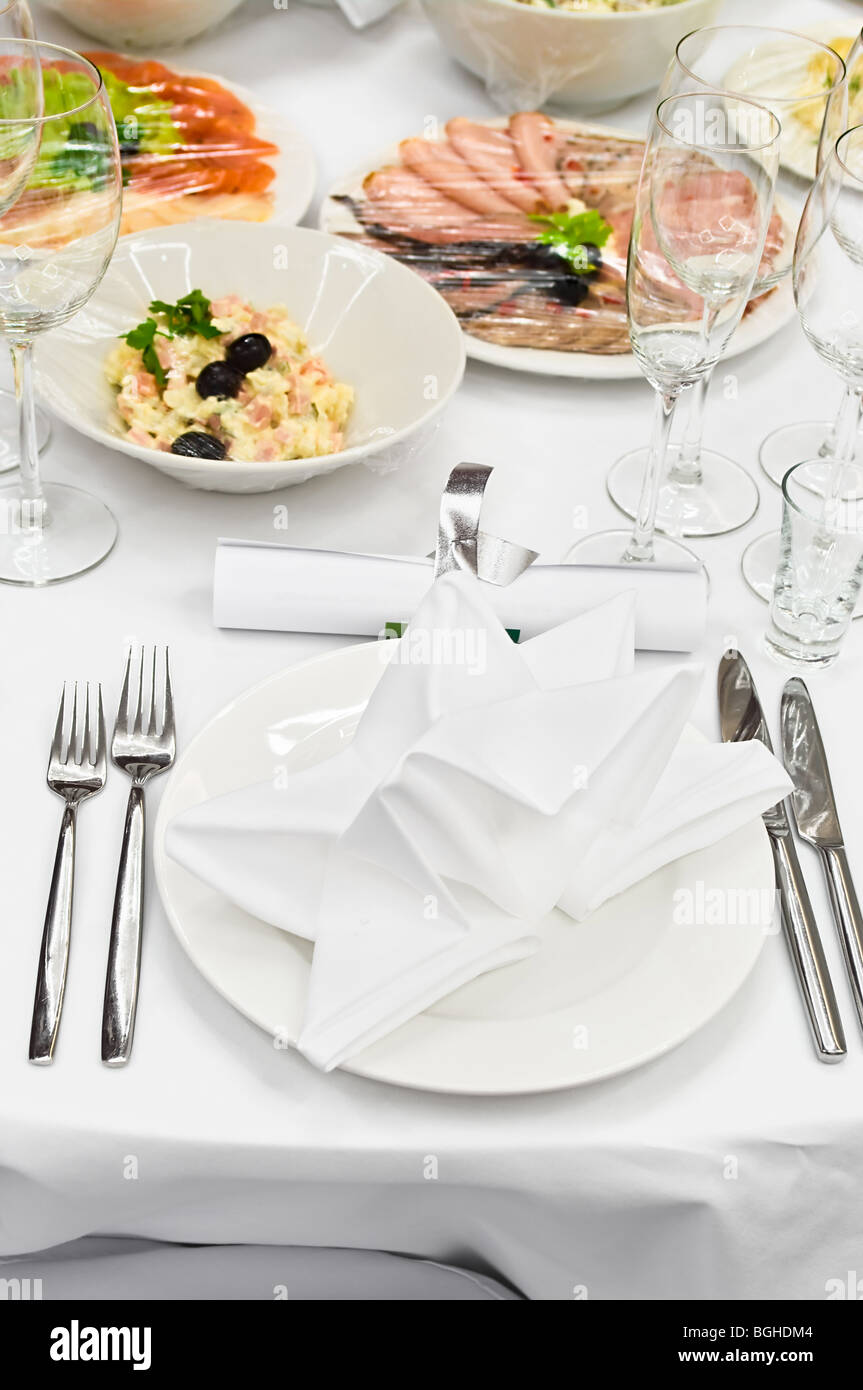 Table appointments for dinner in restaurant. Detail of a fancy table ...