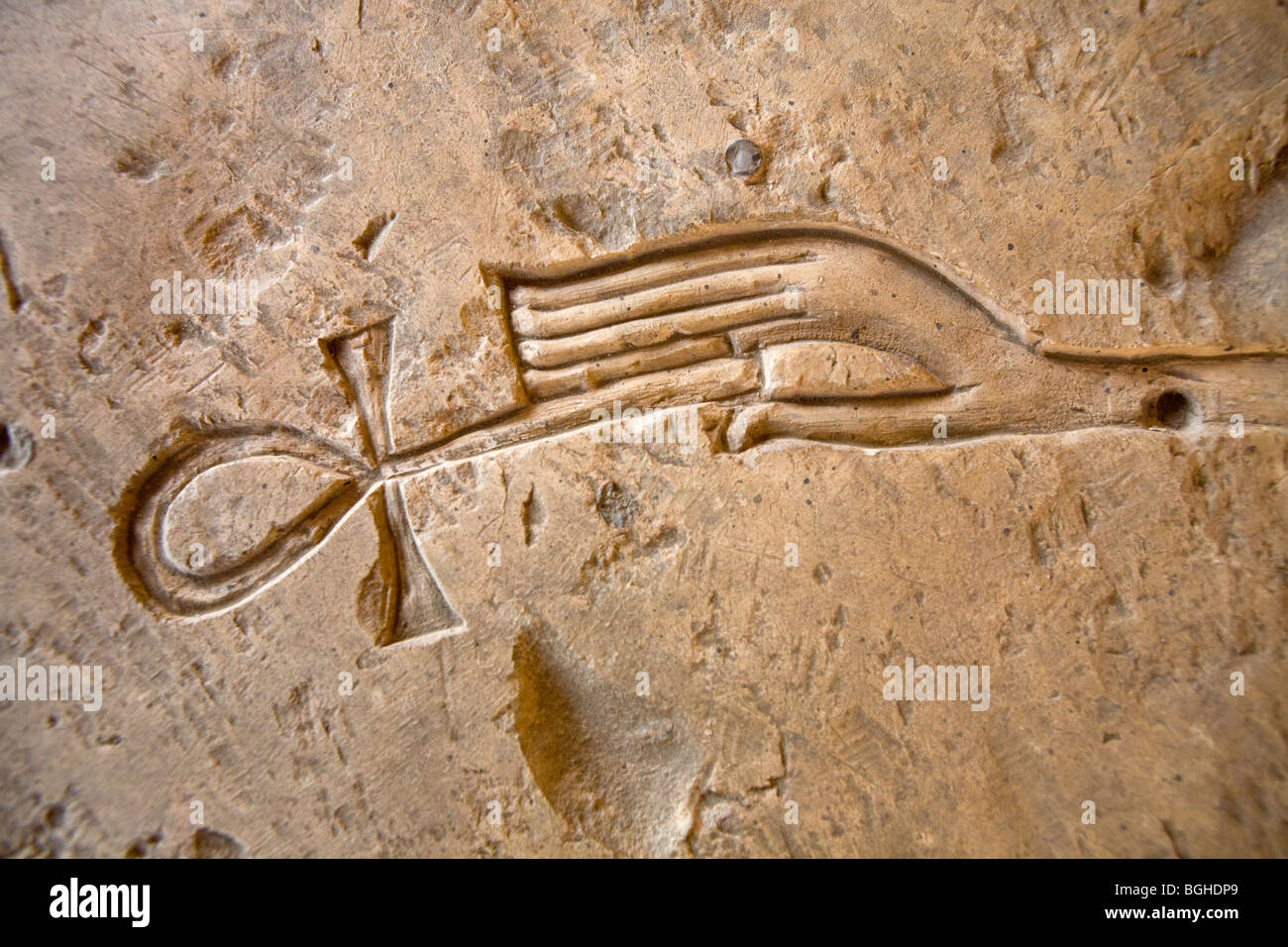 Relief of Hand holding Ankh in Amarna style on a block in the open ...