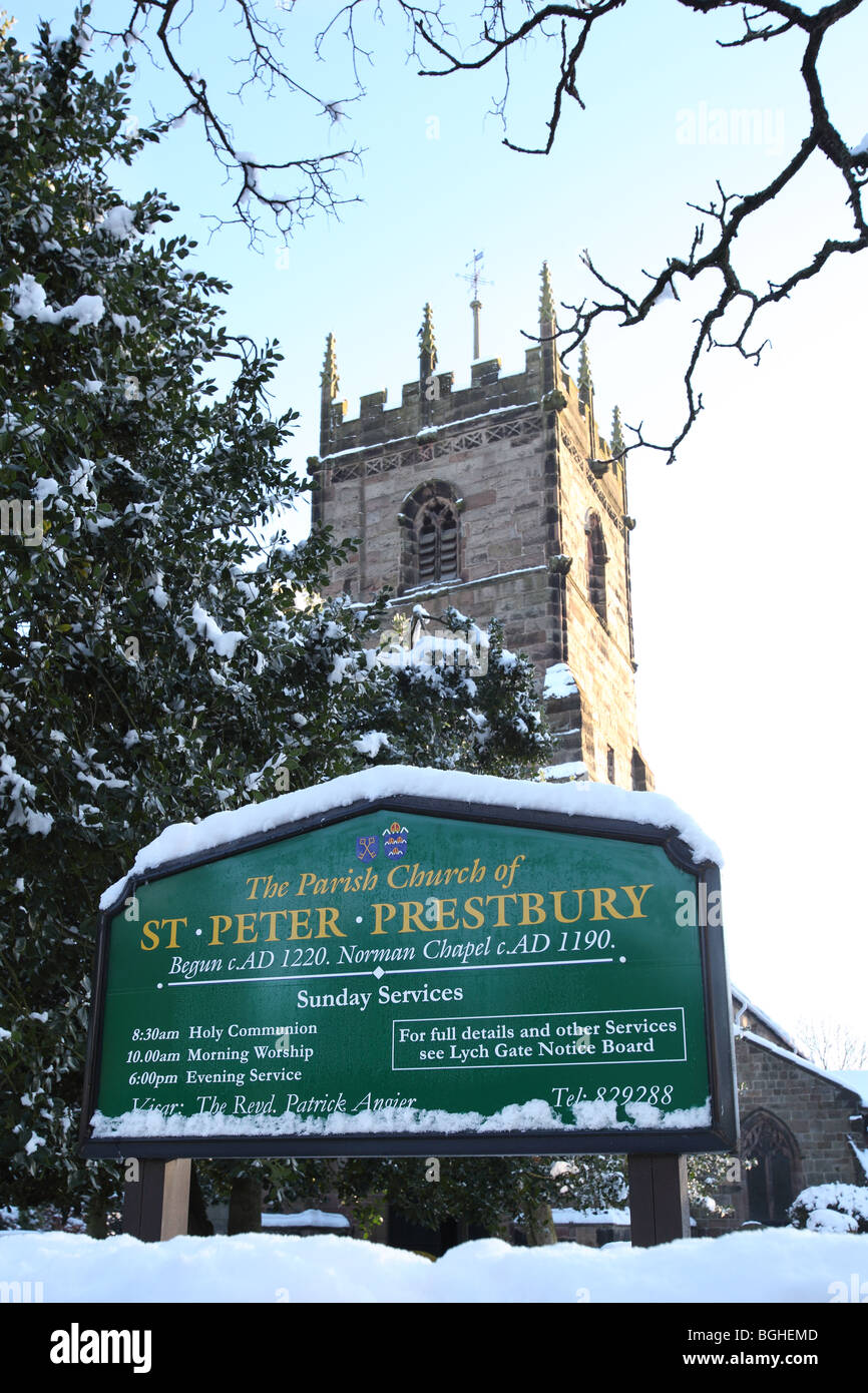 Snowy st Pitter’s church Prestbury exterior cross snow white tree ...