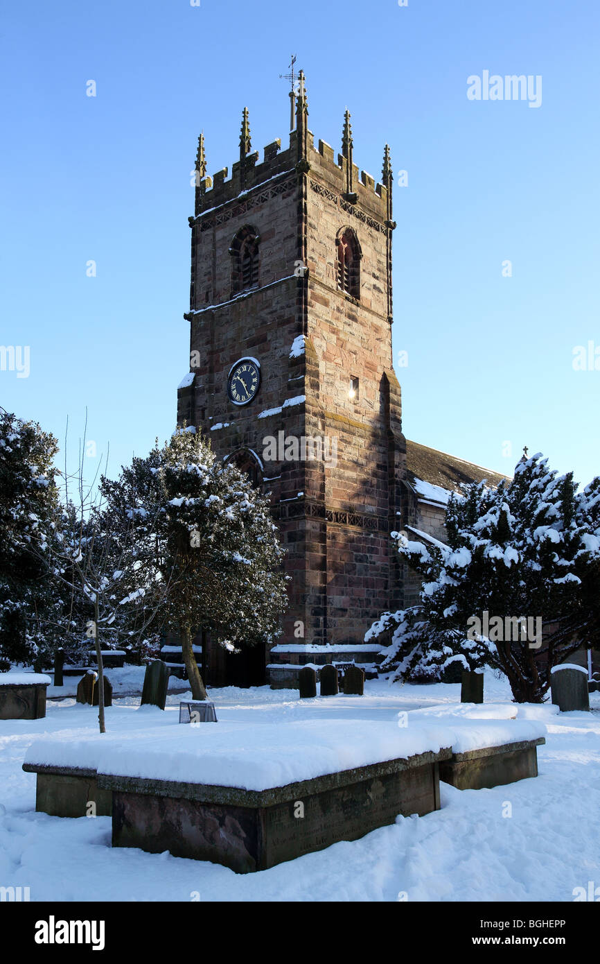 Snowy st Pitter’s church Prestbury exterior cross snow white tree ...