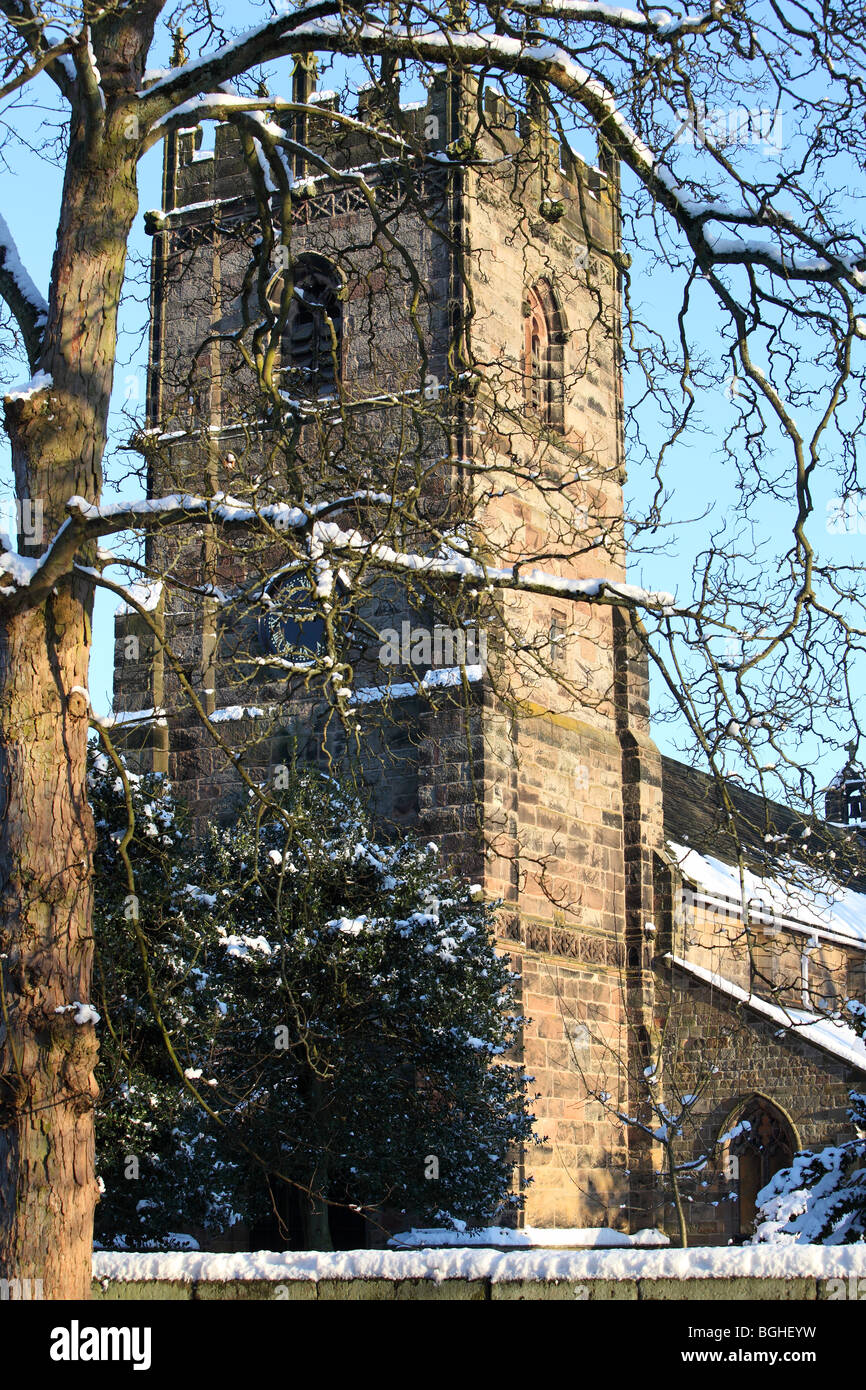 Snowy st Pitter’s church Prestbury exterior cross snow white tree ...