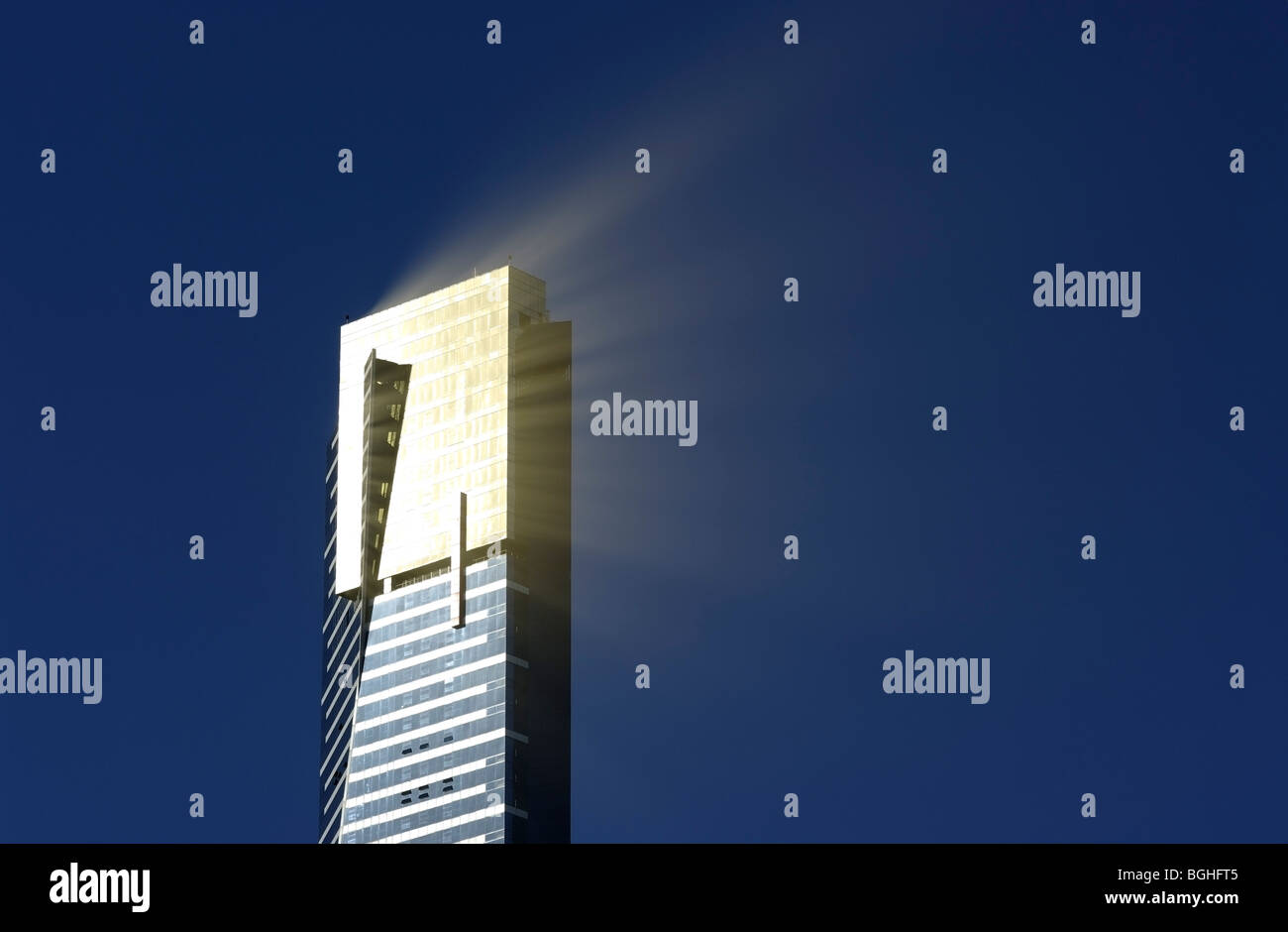 Sun reflecting off the top levels of Eureka Tower, Melbourne, Australia ...