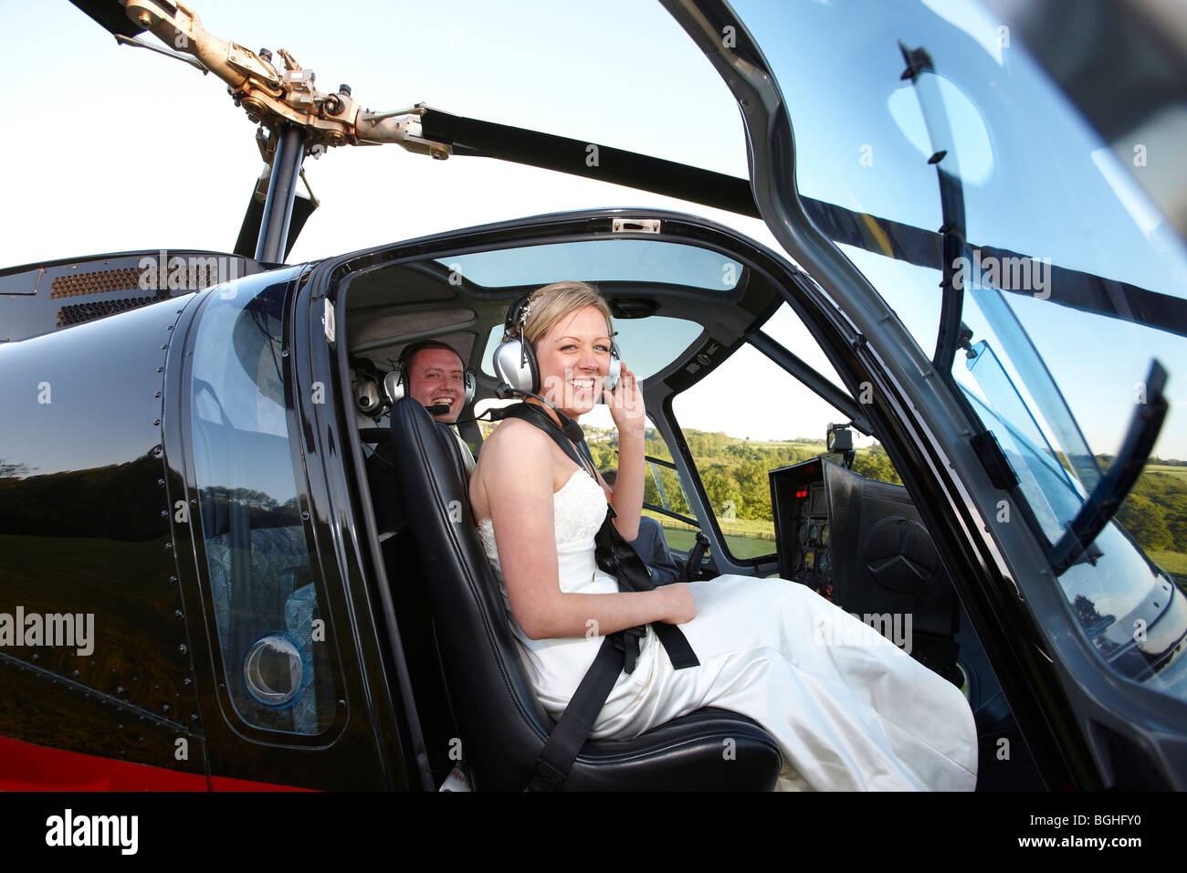 Bride and groom in Chopper Stock Photo - Alamy