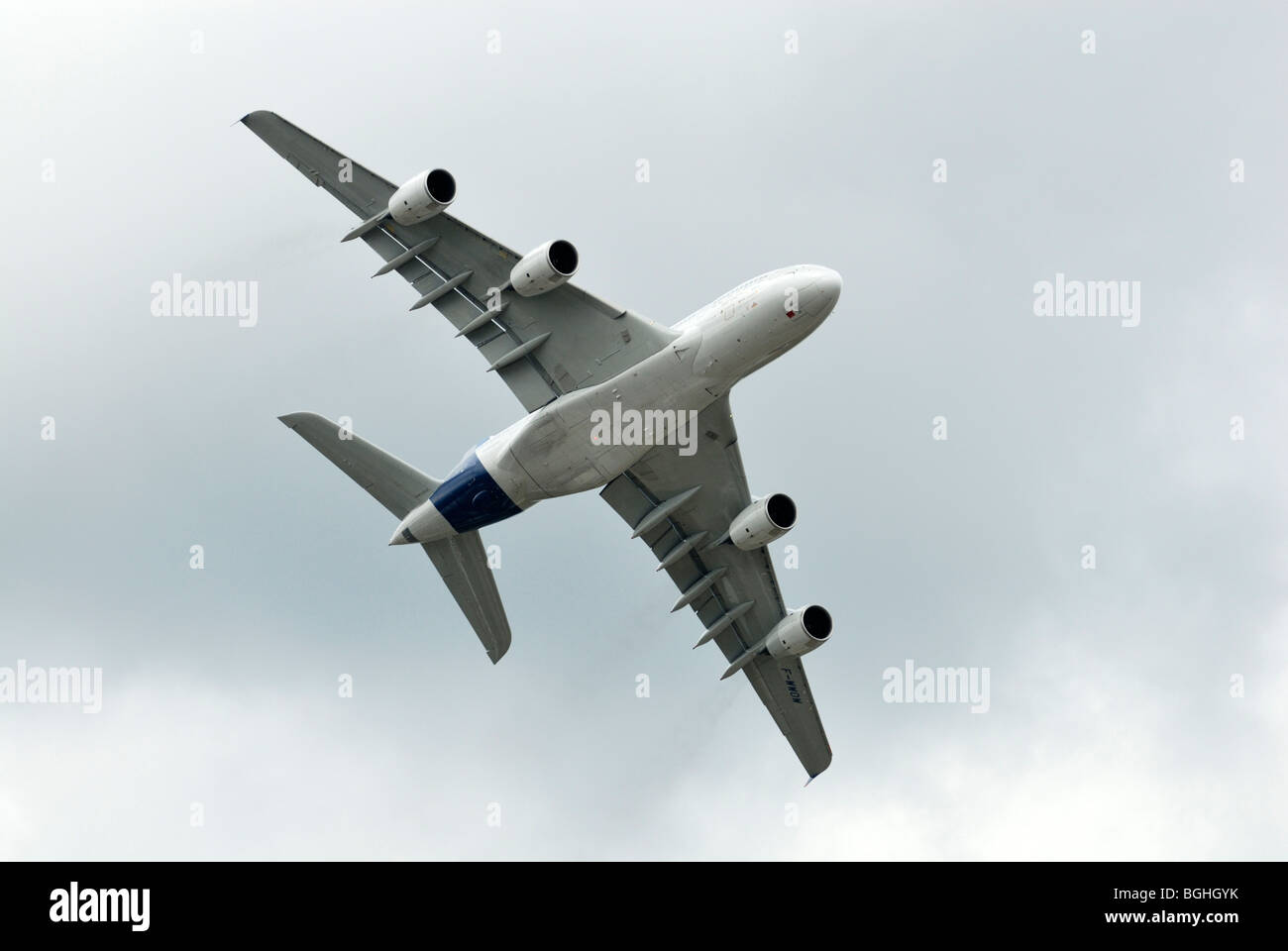 Airbus A380 in flight from underneath Stock Photo - Alamy