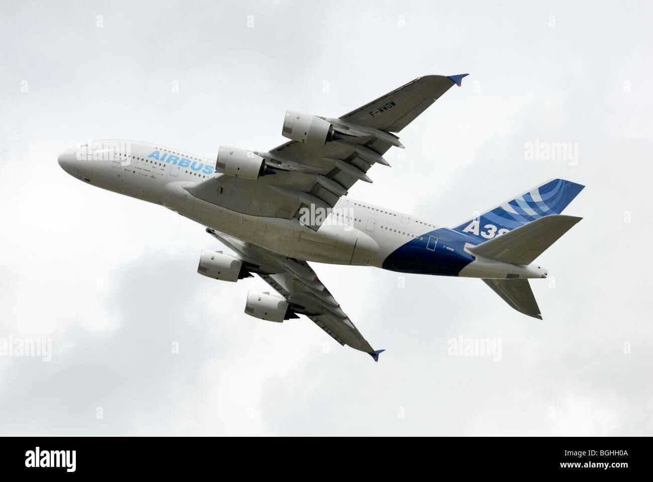 Airbus A380 in flight from underneath Stock Photo - Alamy