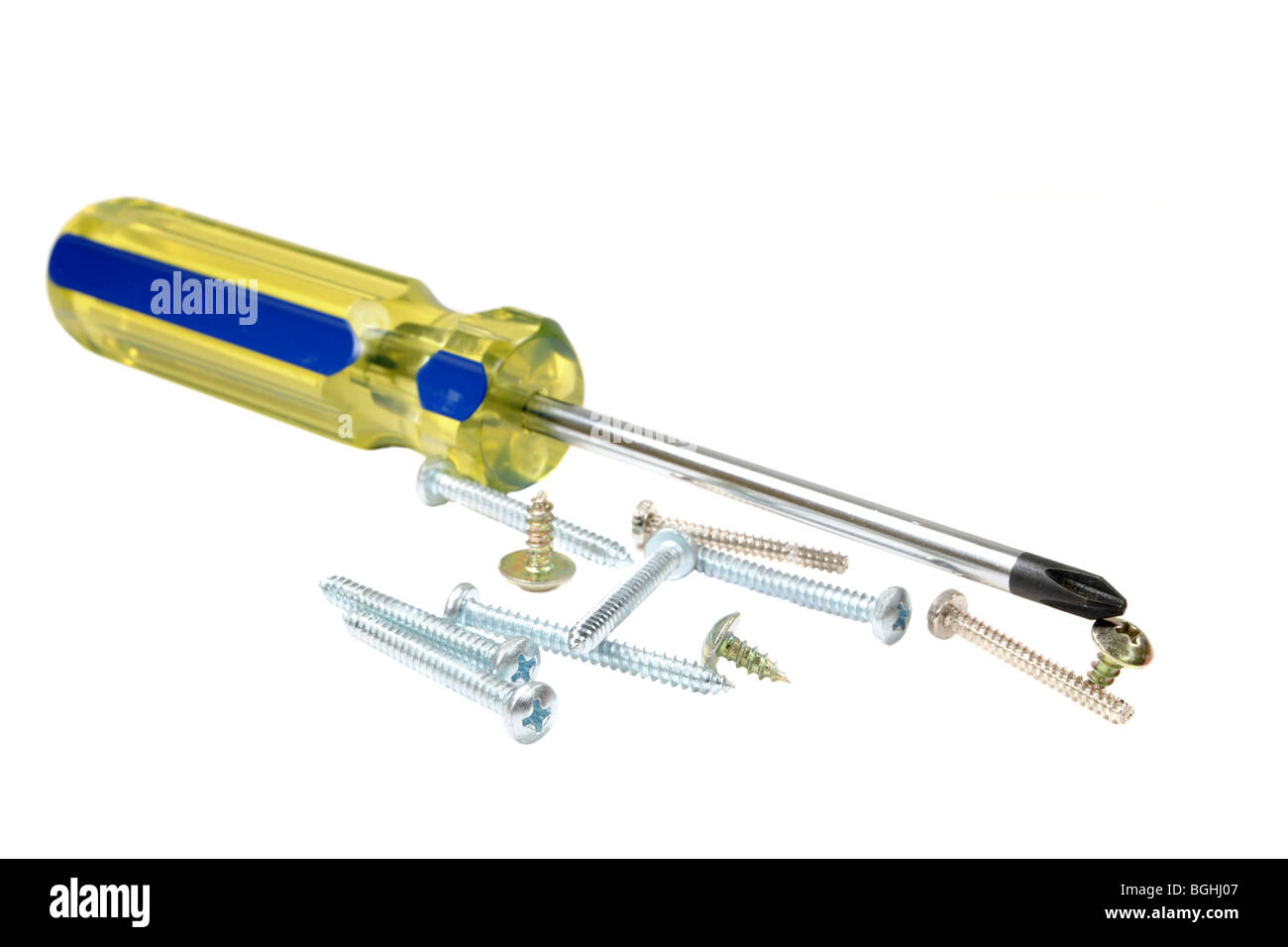 Screw driver and screws isolated on white Stock Photo - Alamy