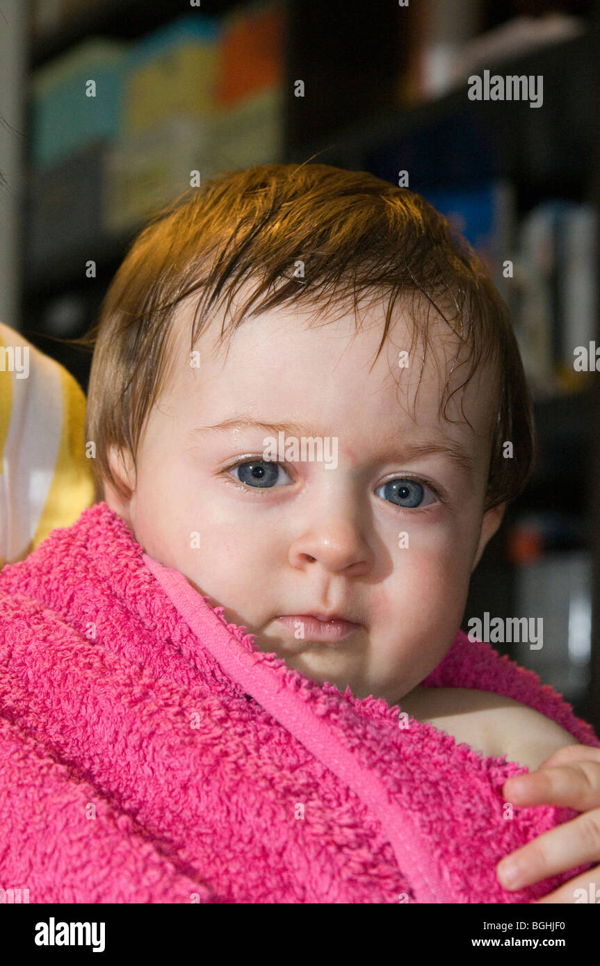 9 months old baby drying up with towel Stock Photo - Alamy