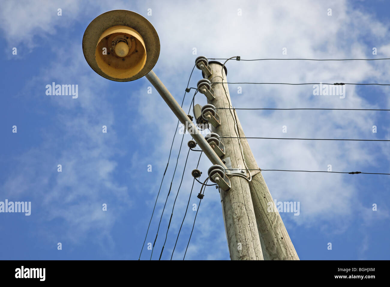 Combined electricity supply pole and lamp post Stock Photo - Alamy