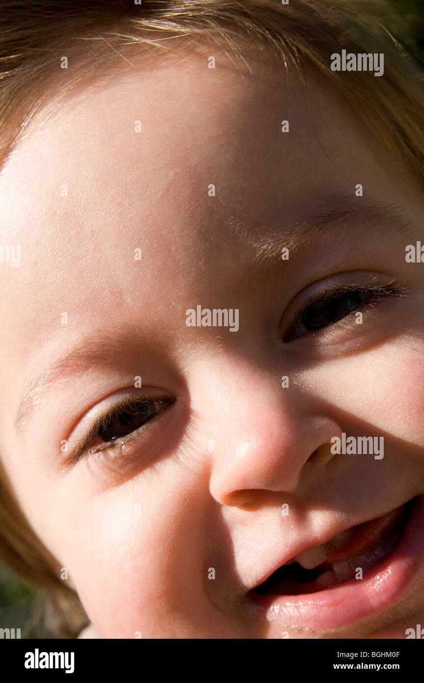 portrait of a one year old baby smiling Stock Photo - Alamy