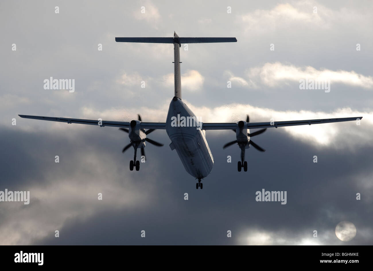 Dash 8 of De Havilland landing at Trudeau airport Stock Photo - Alamy