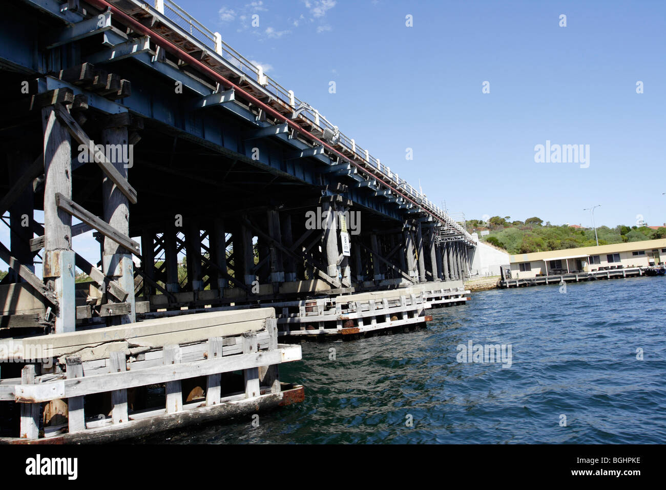 Wooden bridge with foundation protection against collision over Swan ...