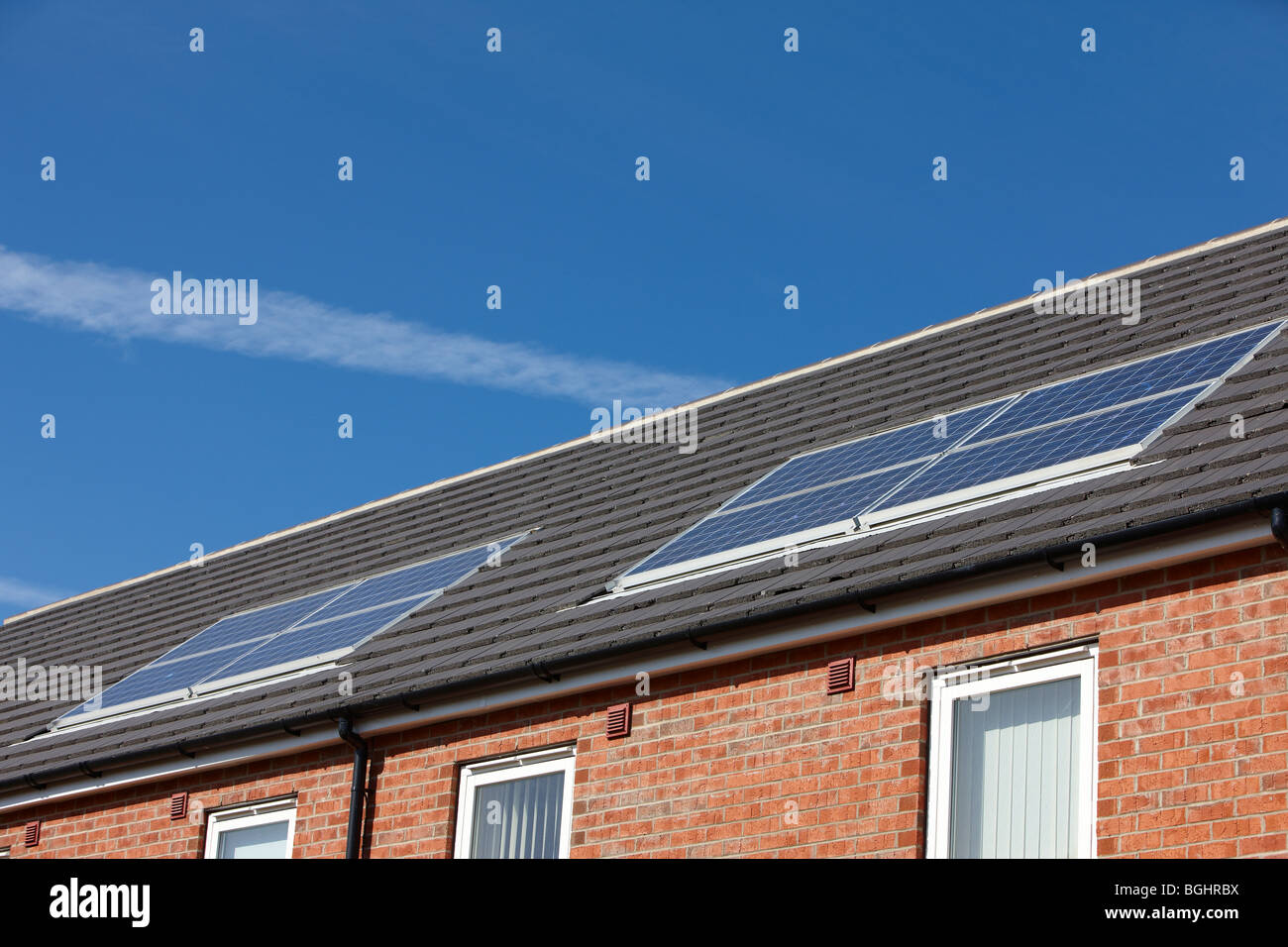 Array of Solar PV panels on roof of house Stock Photo - Alamy