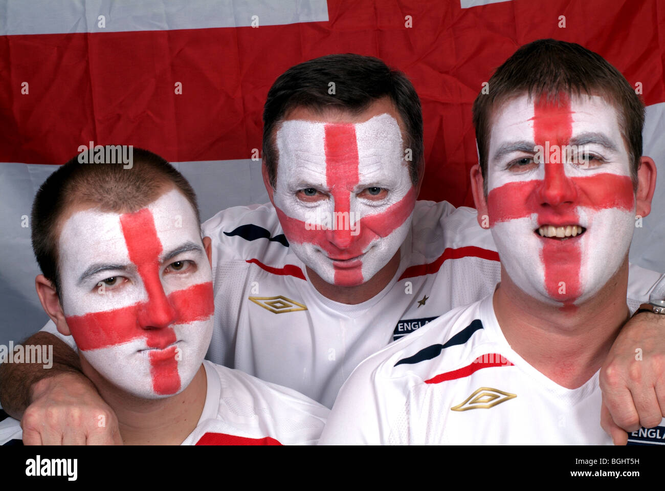 England football fans with faces painted Stock Photo - Alamy