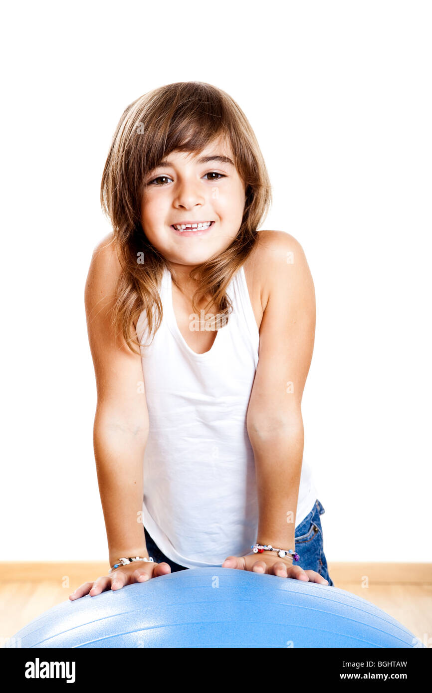 Happy little child playing with a big blue ball Stock Photo - Alamy