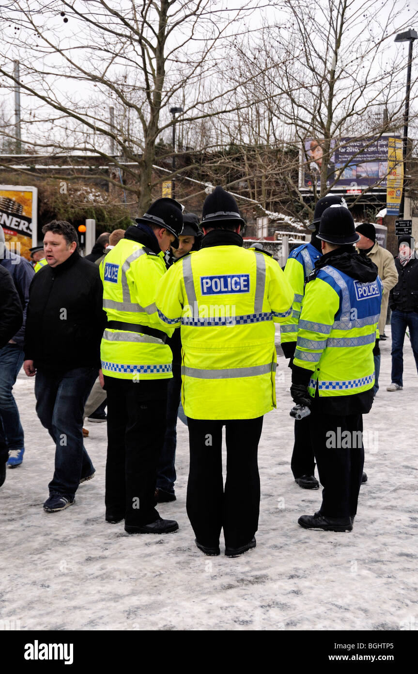 Police Officers in snow outside Arsenal's Emirates Stadium Holloway ...