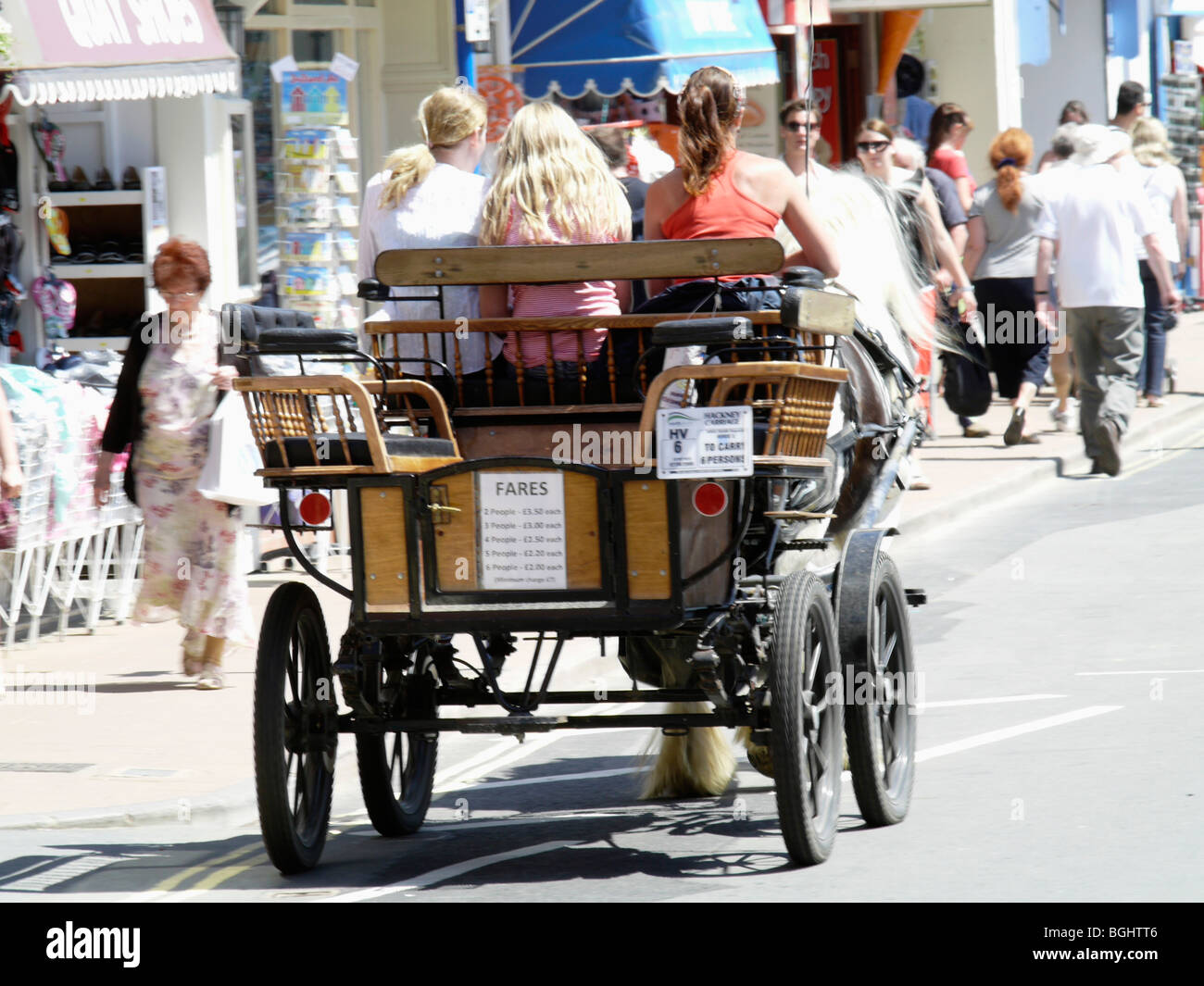 a horse and carriage ride through the streets of the devon holiday ...