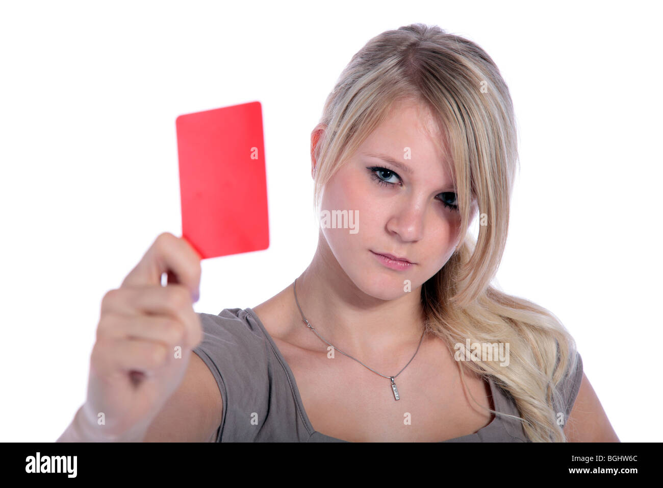 An attractive young woman showing someone a red card. All on white ...