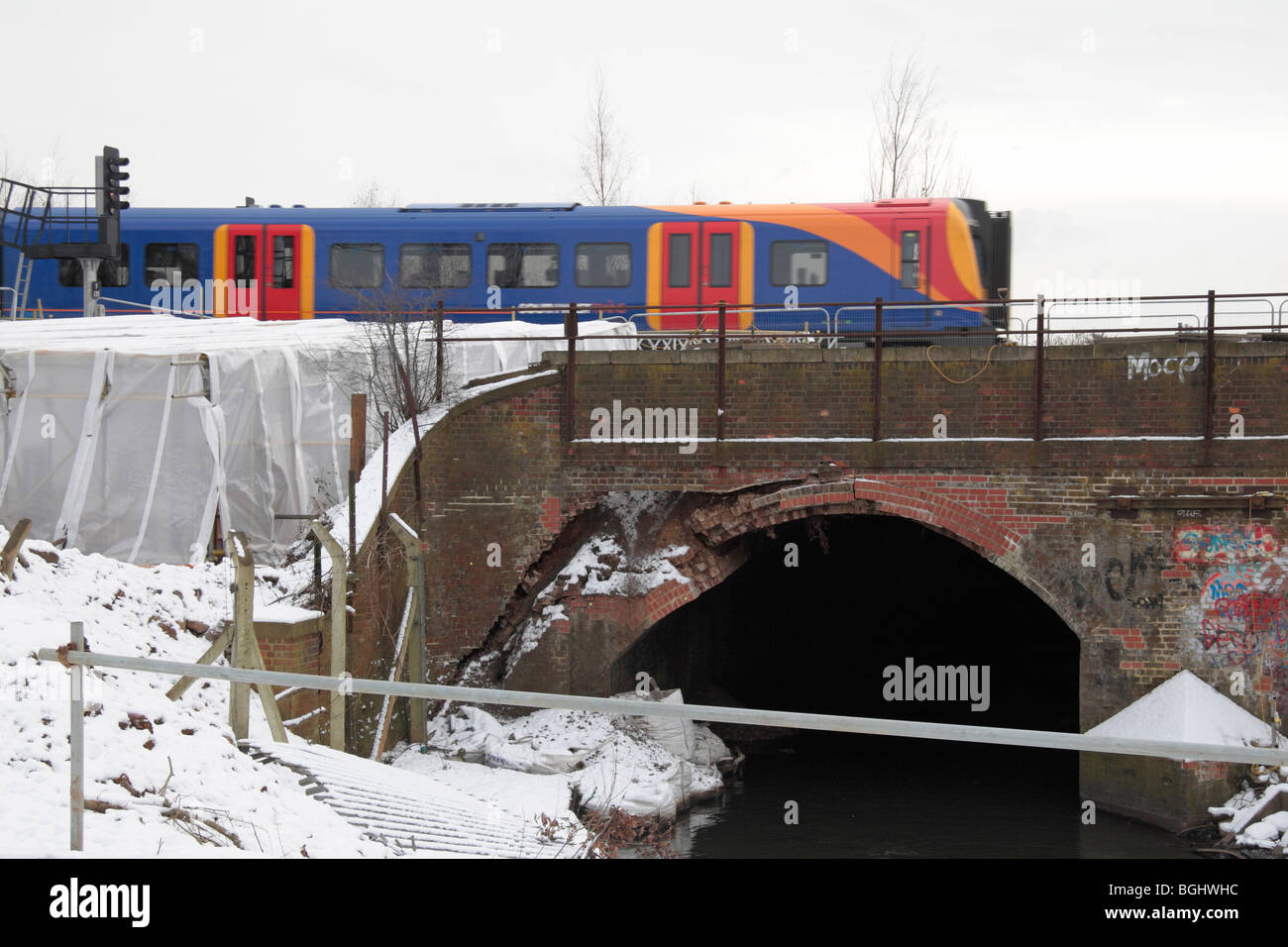 A South West Trains passing over the collapsed (16 November 2009) River ...