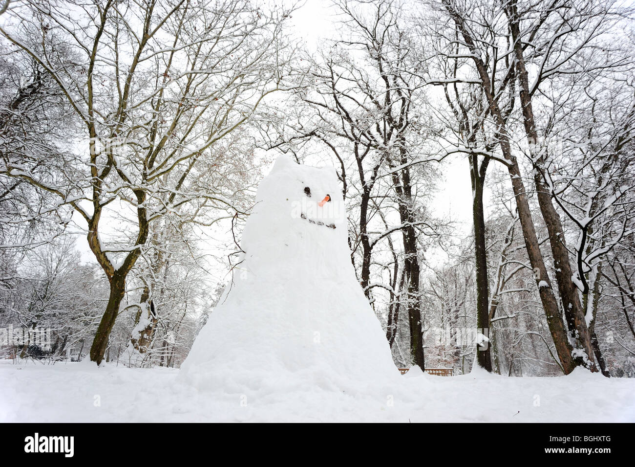 Snowman in winter park Stock Photo - Alamy