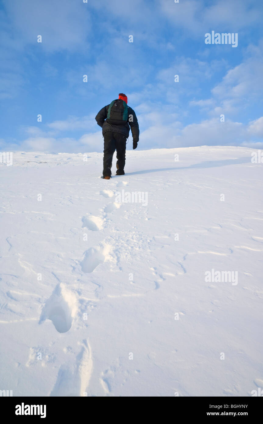 Walking through deep snow hi-res stock photography and images - Alamy
