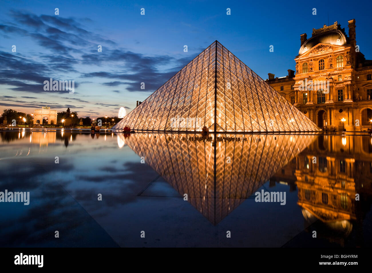 Louvre pyramid sunset hi-res stock photography and images - Alamy