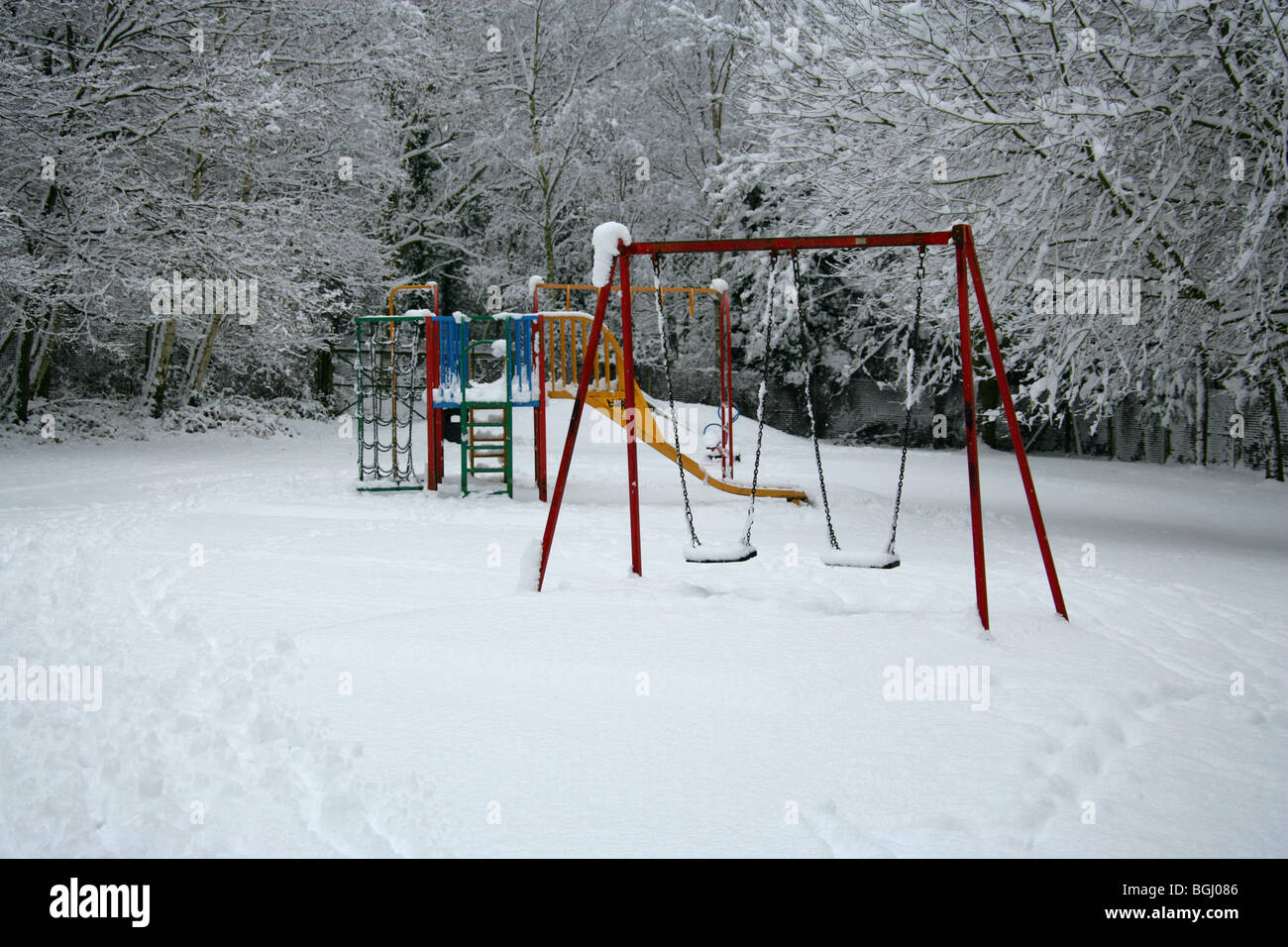 A Snow Covered Children's Playground in Winter Stock Photo - Alamy
