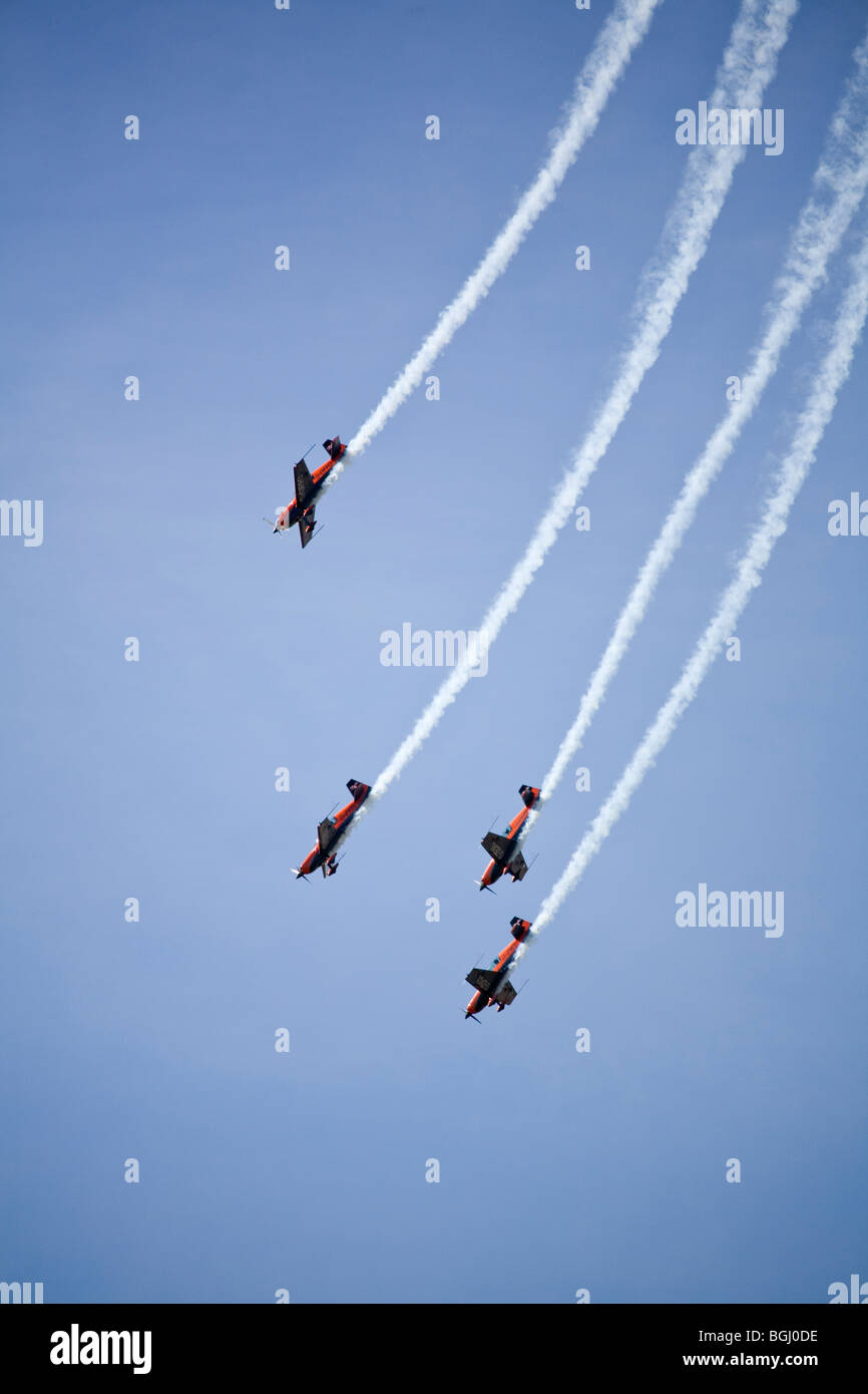 Blades aerobatic display team flying Extra 300 LP aircraft at RAF ...