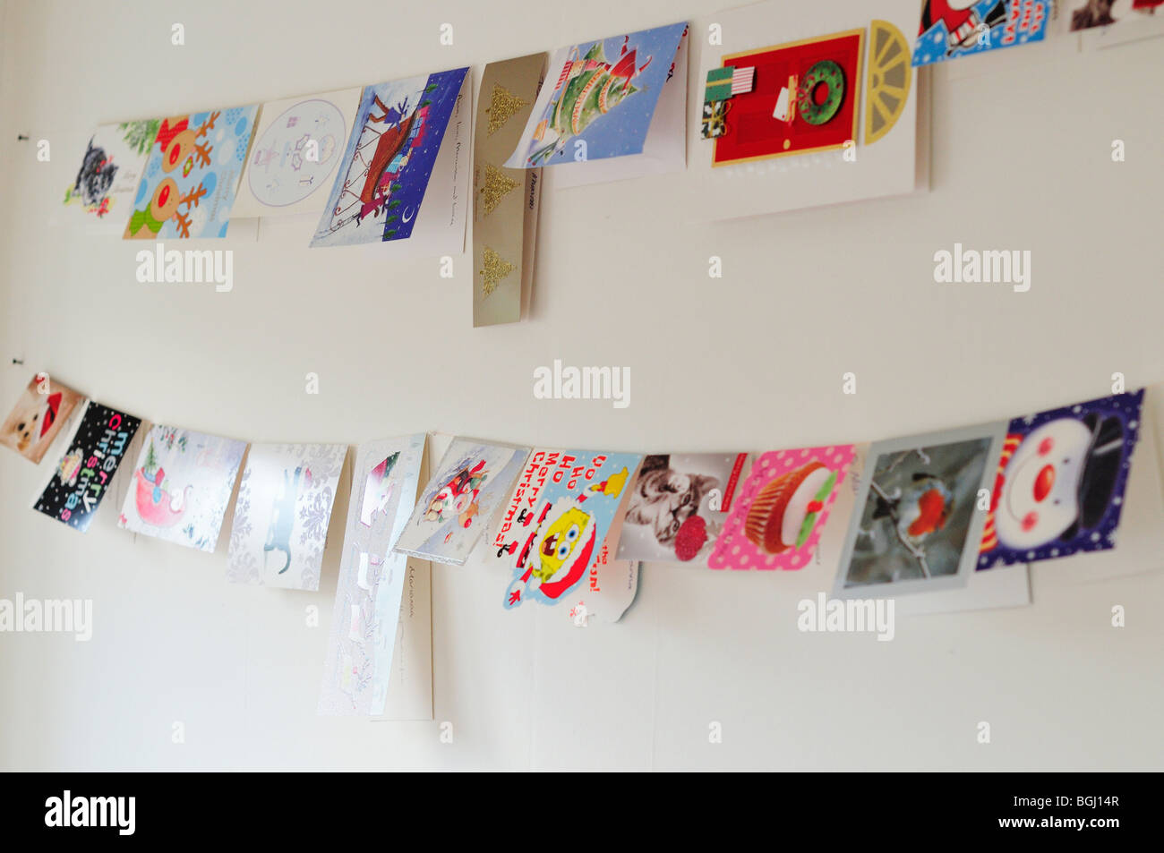 String of cards hi-res stock photography and images - Alamy
