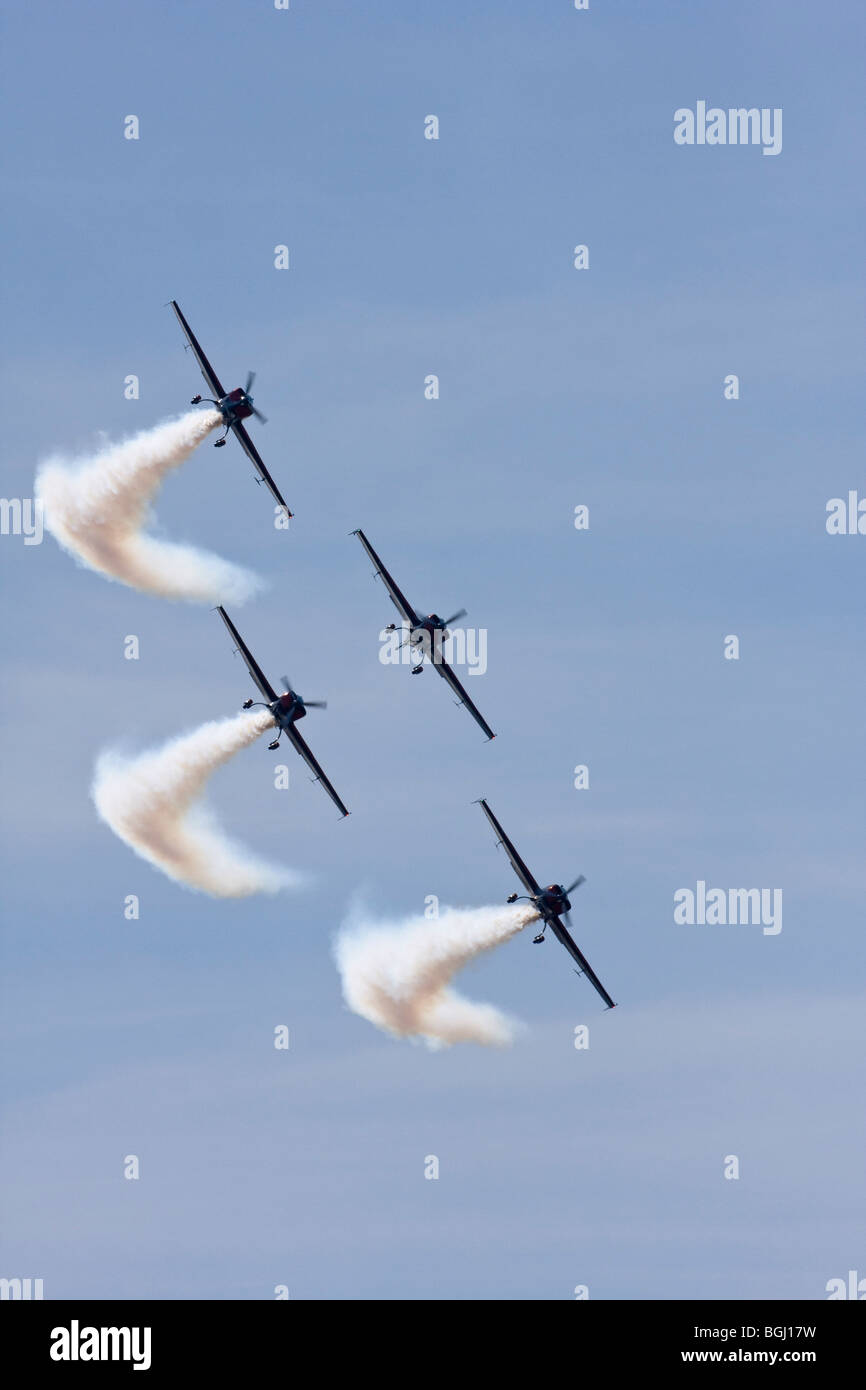 Blades aerobatic display team flying Extra 300 LP aircraft at RAF ...