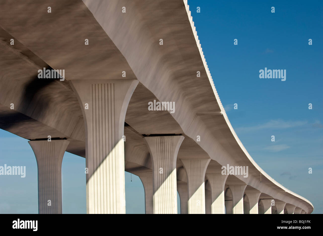 underside of long winding bridge Stock Photo - Alamy