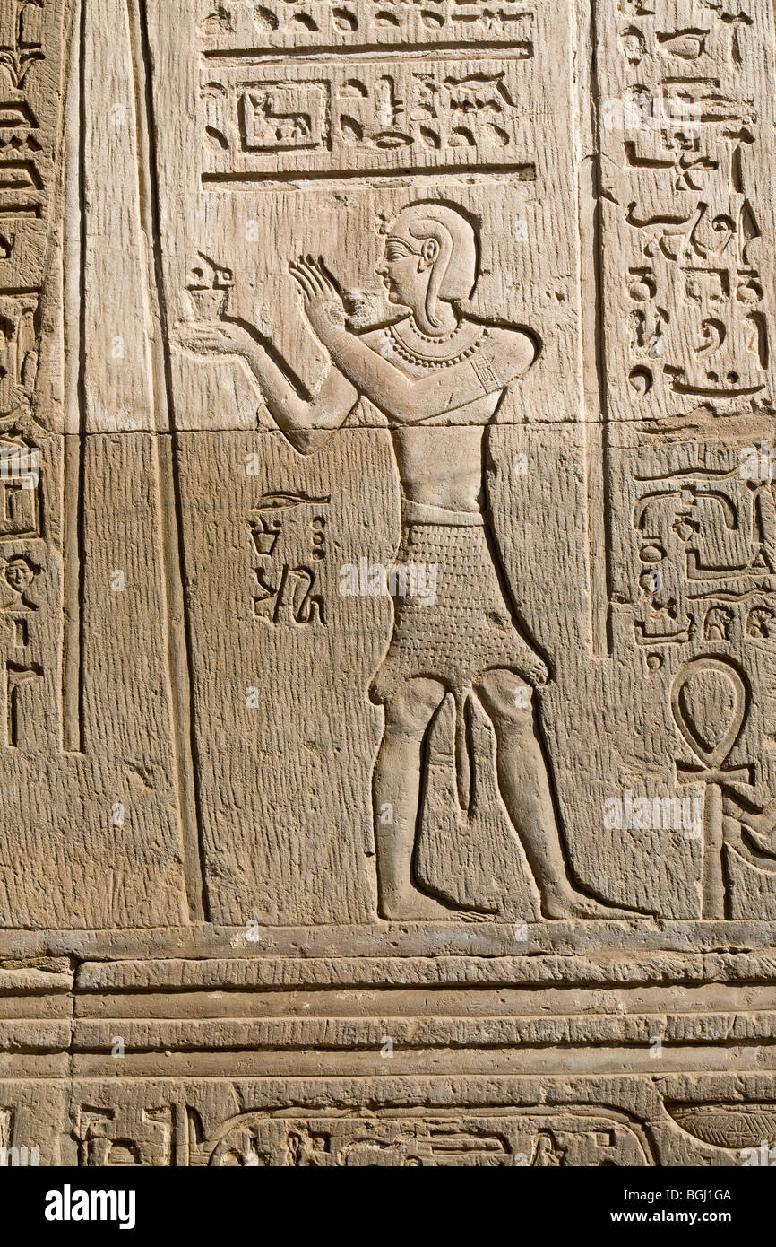 Relief on outer wall at the Temple of Haroeris and Sobek at Kom Ombo in ...